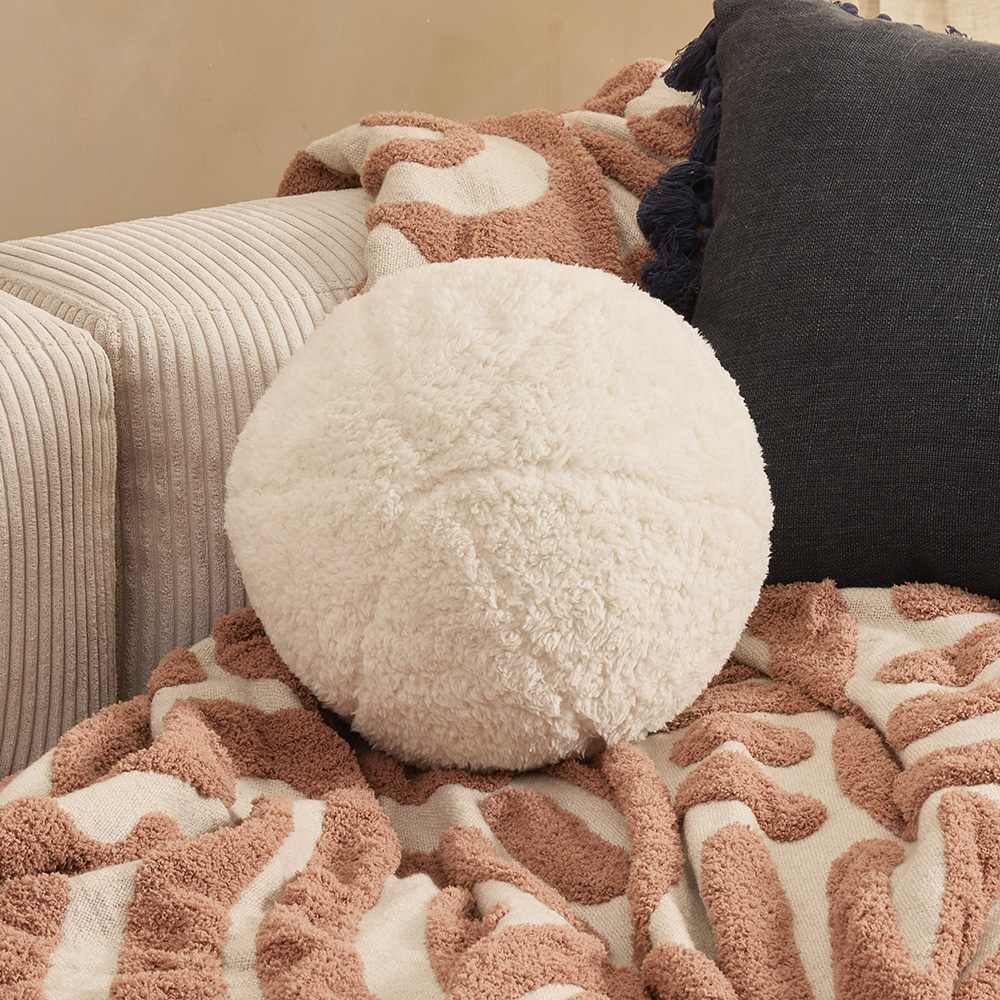 Kyrie Natural Fleece Ball Cushion | Adairs